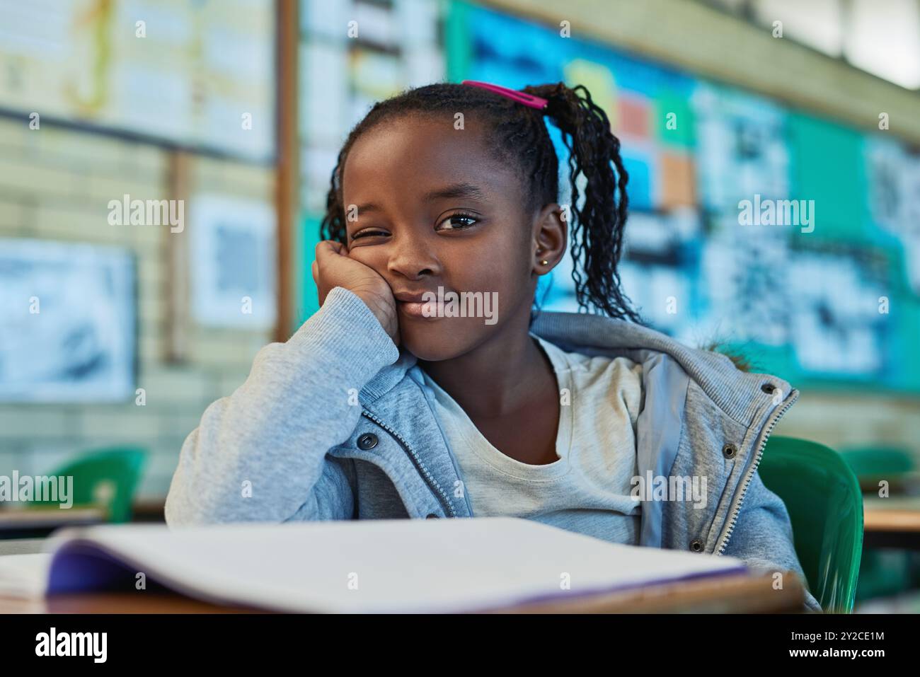 Bored, portrait and black child in classroom at elementary school in ...