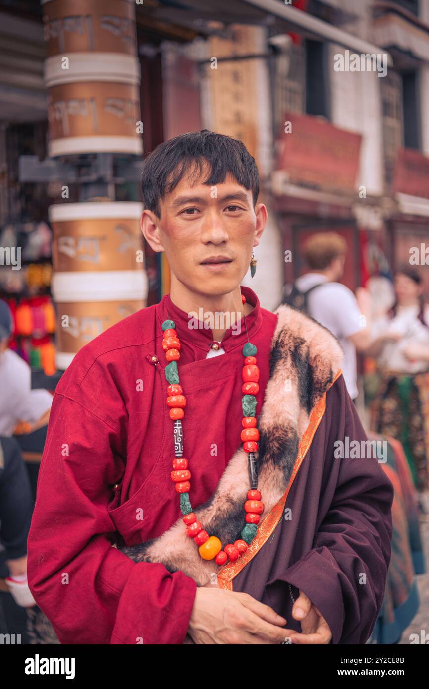 LHASA, TIBET CHINA - JULY 3, 2022: A man wearing traditional Tibetan ...