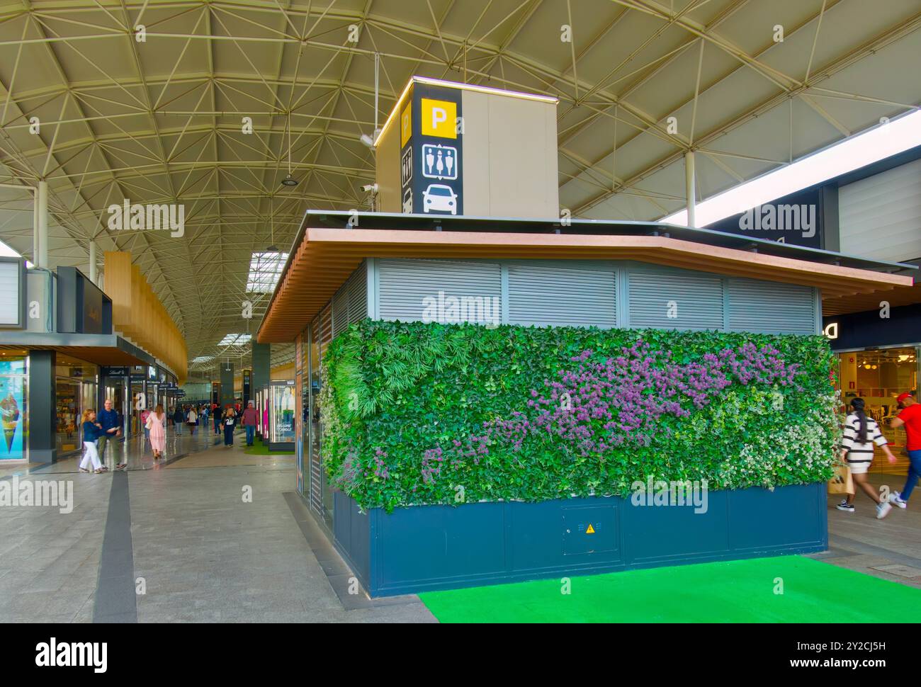 Inside the Fashion Outlet shopping centre pedestrianised covered ...