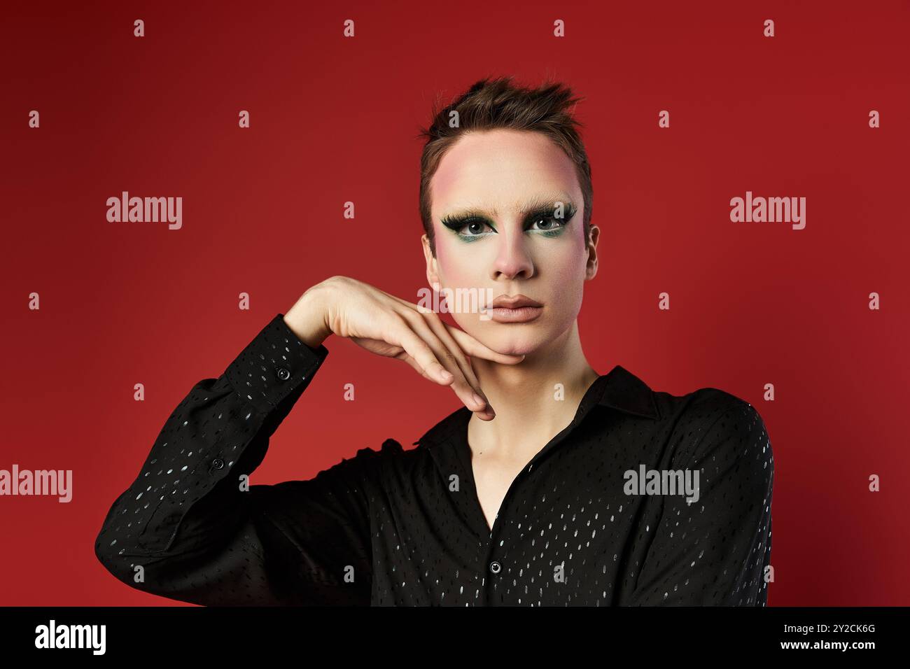 A young drag performer showcases fashion and art through dynamic posing ...