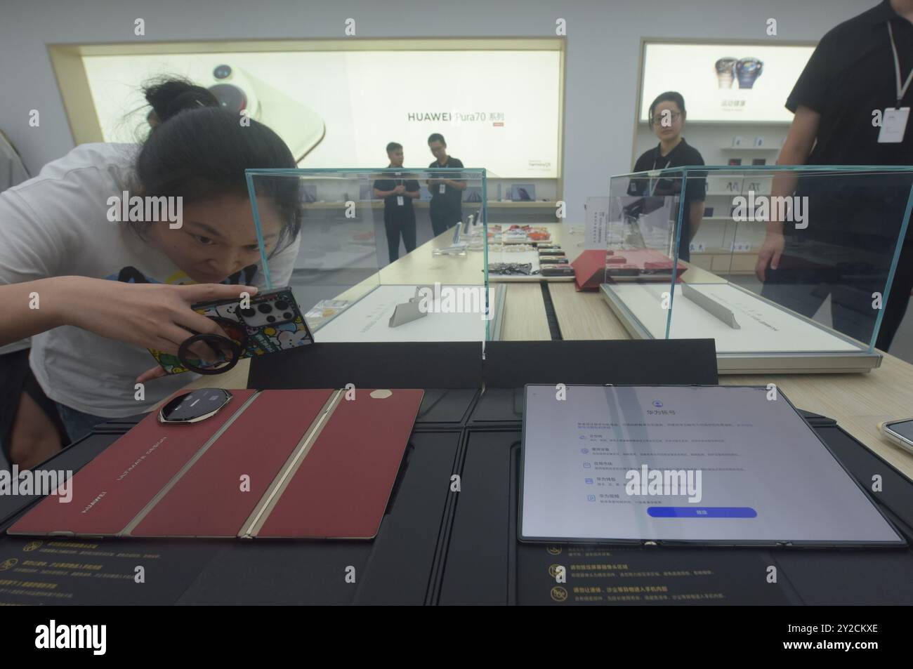HANGZHOU, CHINA - SEPTEMBER 10, 2024 - Customers experience the world's ...