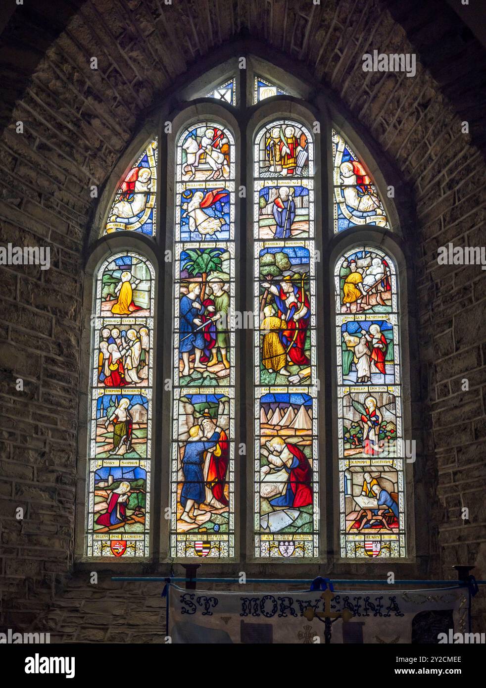 Stained glass window inside Church of St Morwenna and St John the ...