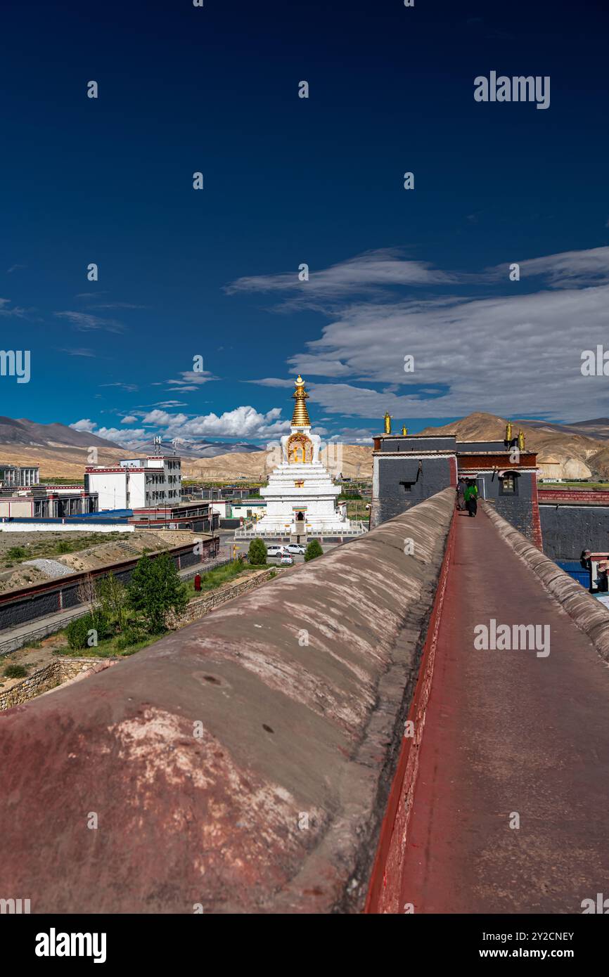 Scenic view of a large red buddhist building in Sakya monastery on a ...