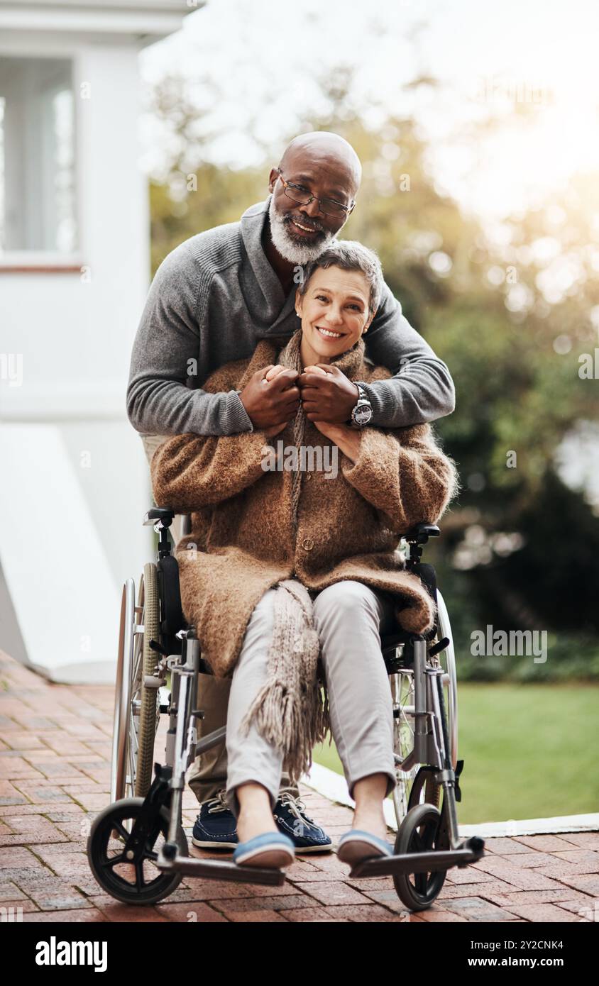 Senior woman, wheelchair and man for hug, love or portrait with empathy ...