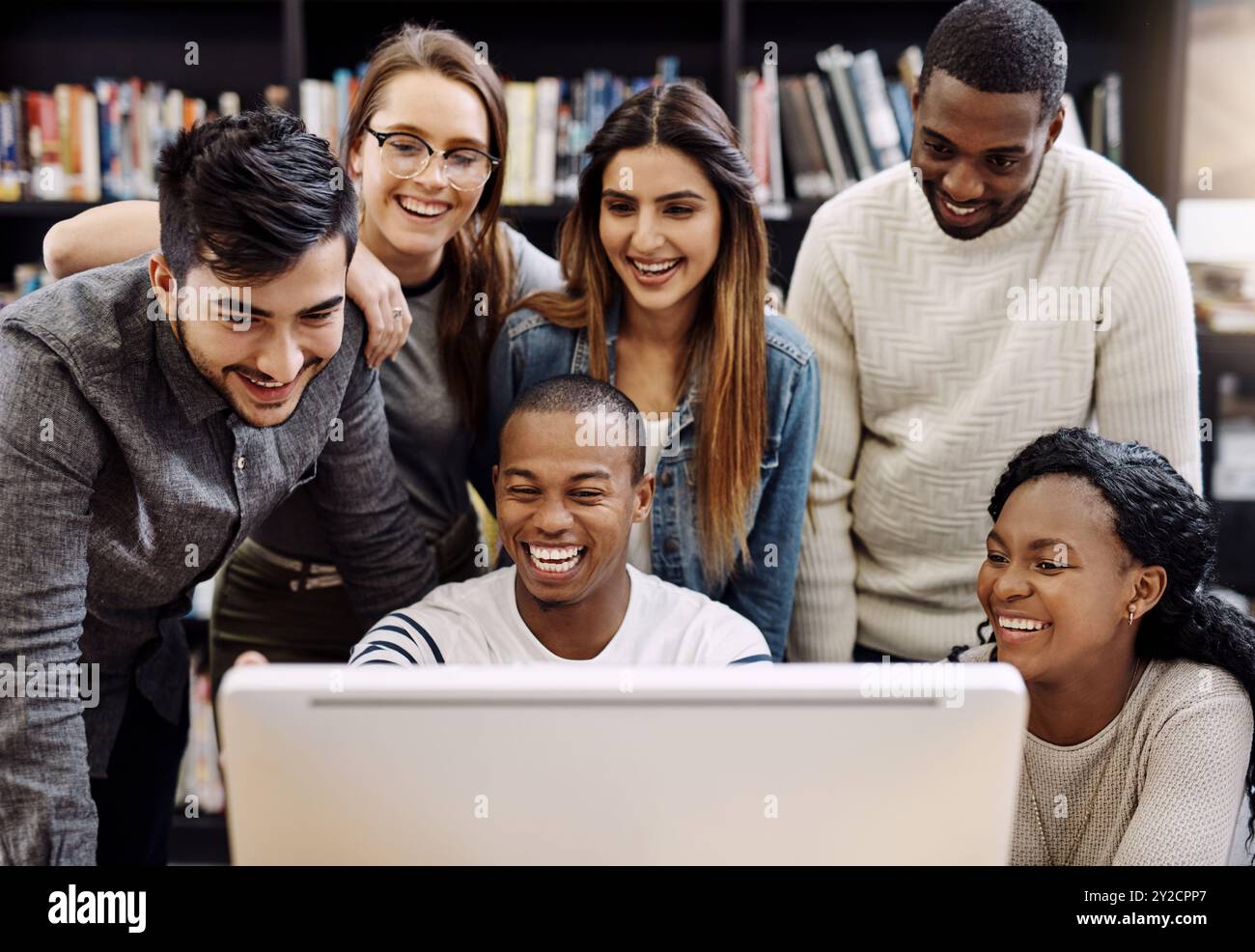 Students, computer and learning in library for education, study and ...