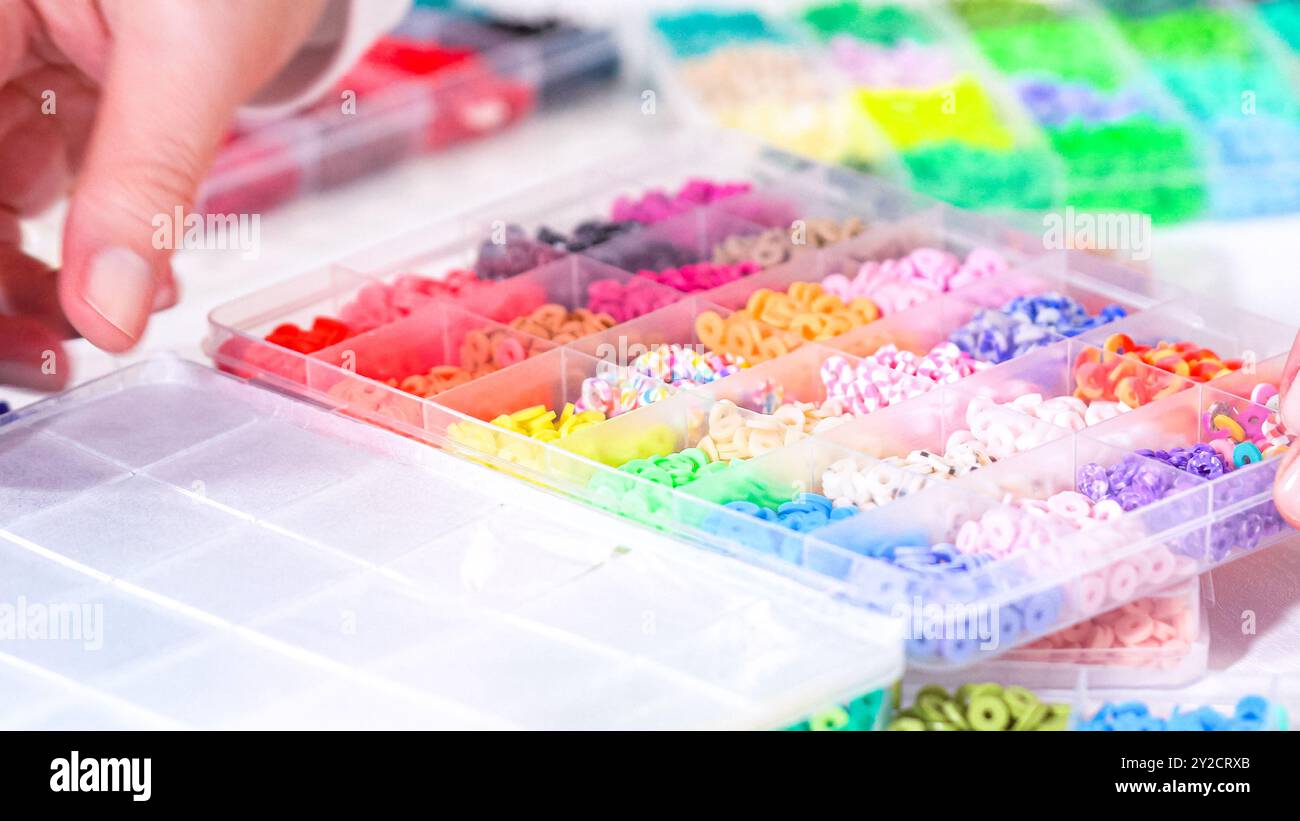 Kids crafting beads hi-res stock photography and images - Alamy