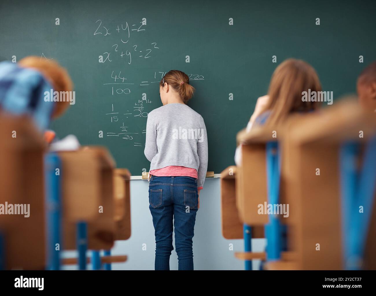 School, classroom and back of girl by chalkboard for math quiz, test ...