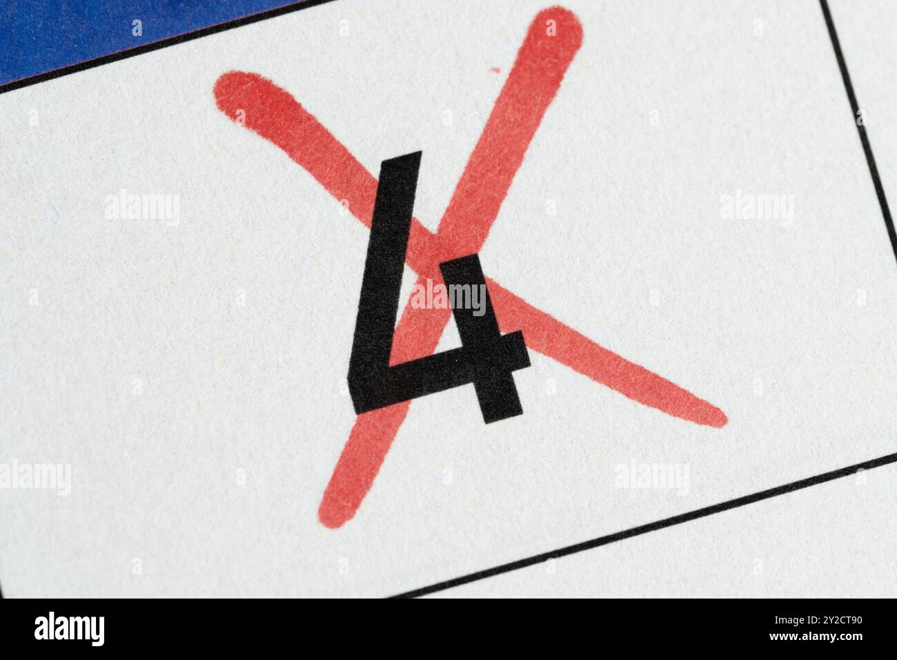 Fourth number is crossed out with red marker on calendar Stock Photo ...