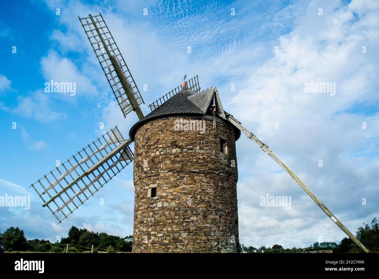 rear view of Old windmill on the coast of the Atlantic ocean in ...