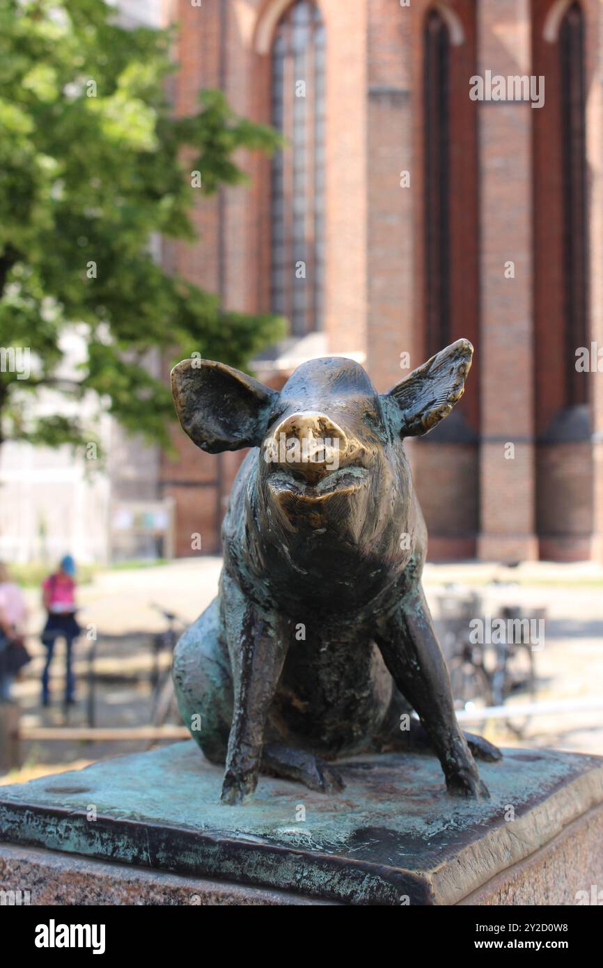 Bronze Pig Sculpture on the Historic Schweinsbrücke in Wismar, Germany ...