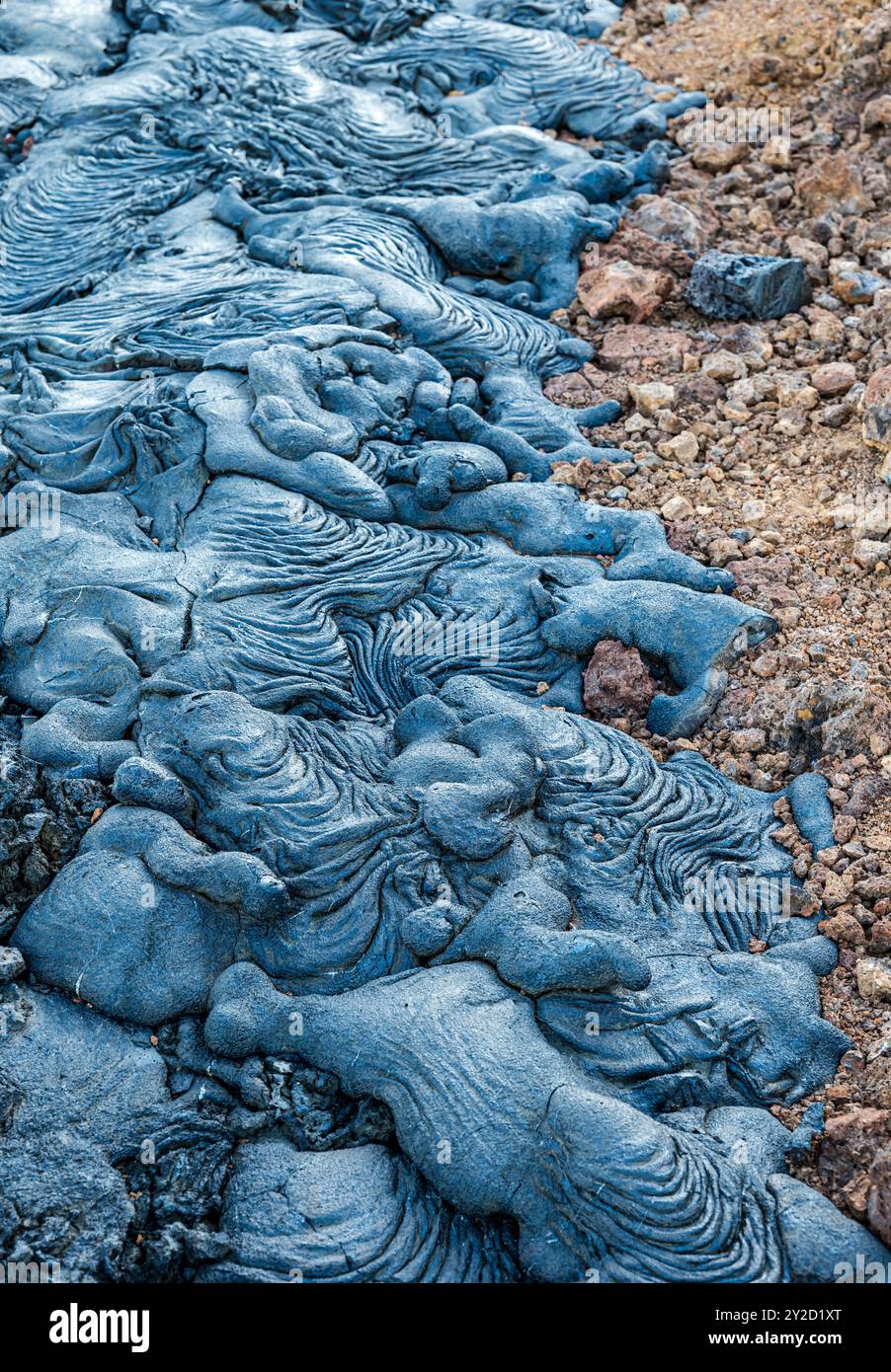 Molten lava patterns showing cooled lava flow in volcanic rock ...