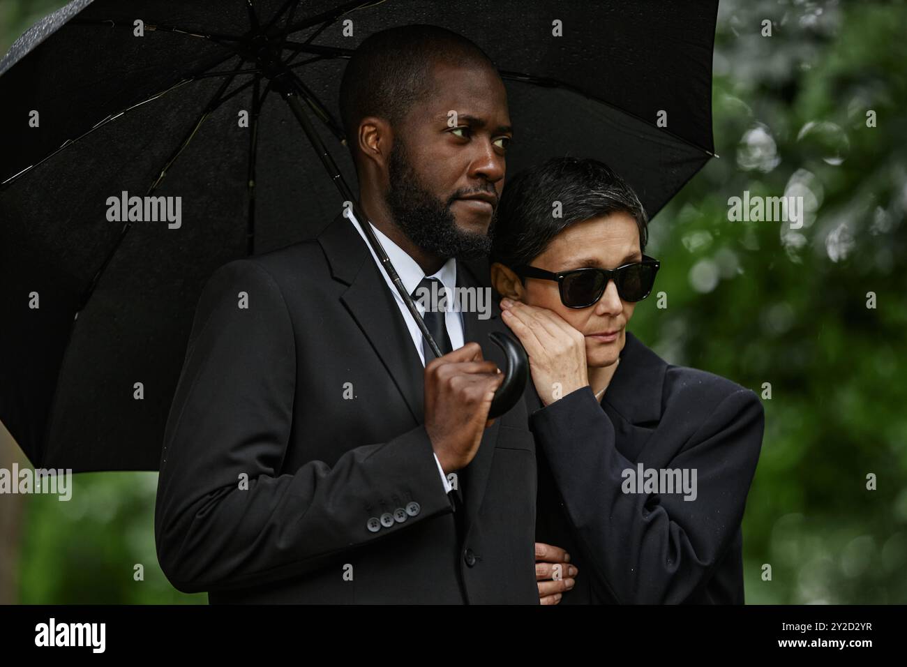 Medium shot of senior woman holding supportive husband by arm grieving ...