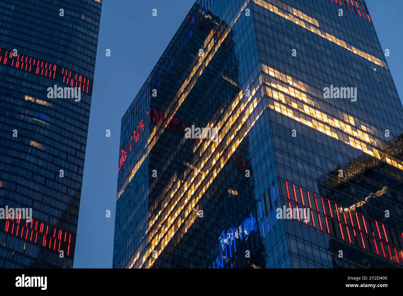 Modern Moscow City towers against a blue sky. Tall glass skyscrapers ...