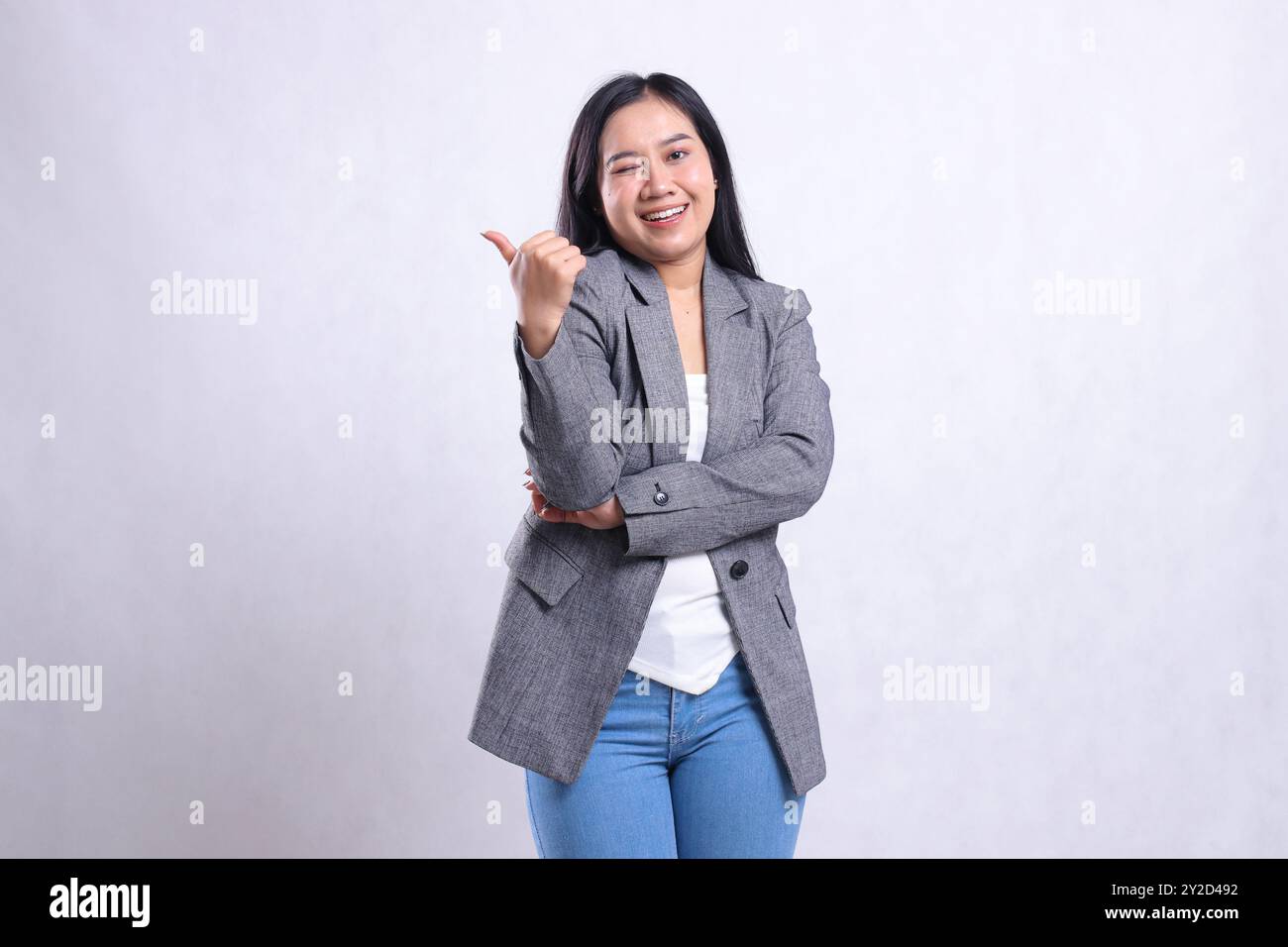 expression of beautiful adult ladies cheerful wink eye embrace thumbs ...