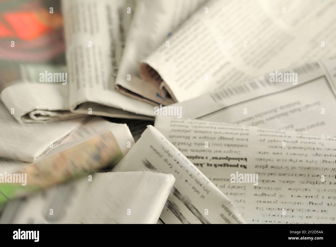Many newspapers in different languages as background, closeup Stock ...