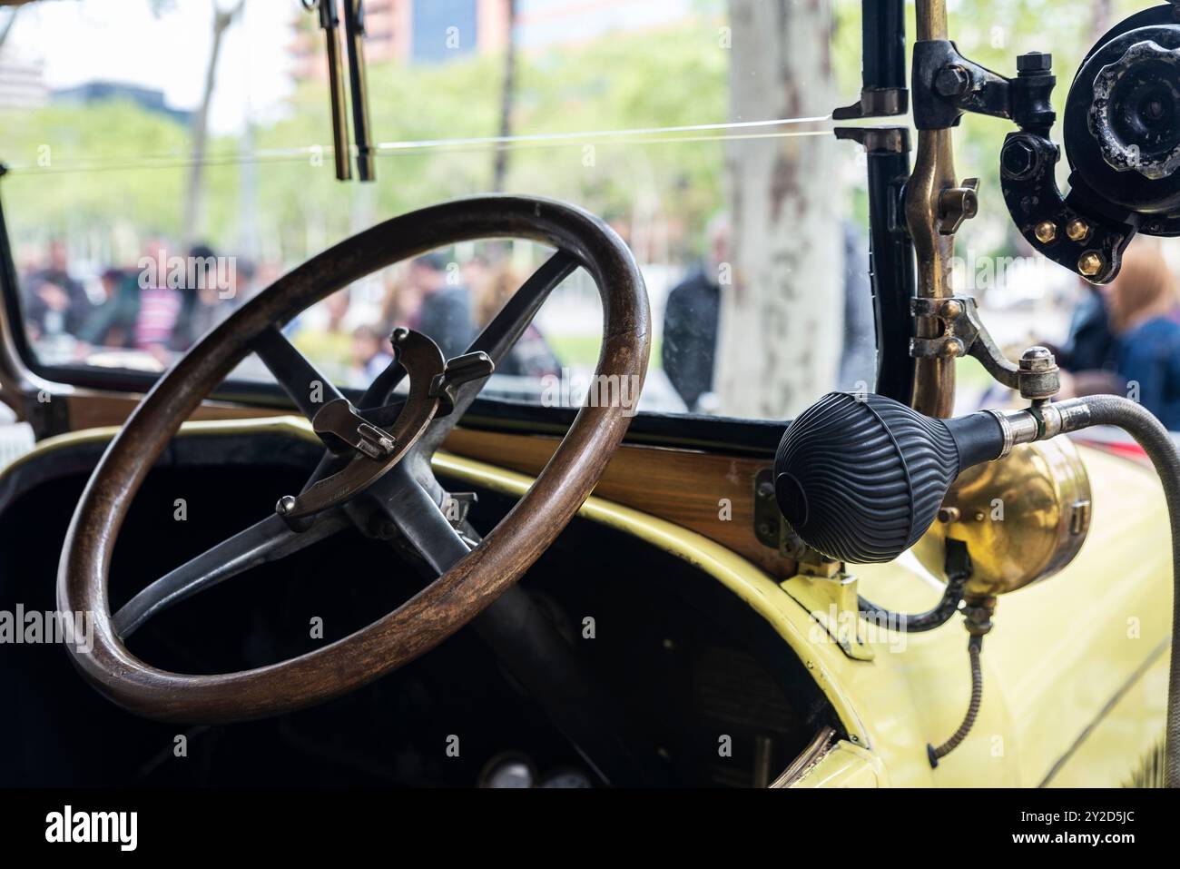 Steering wheel and dashboard of an old retro car from the 1920s parked ...