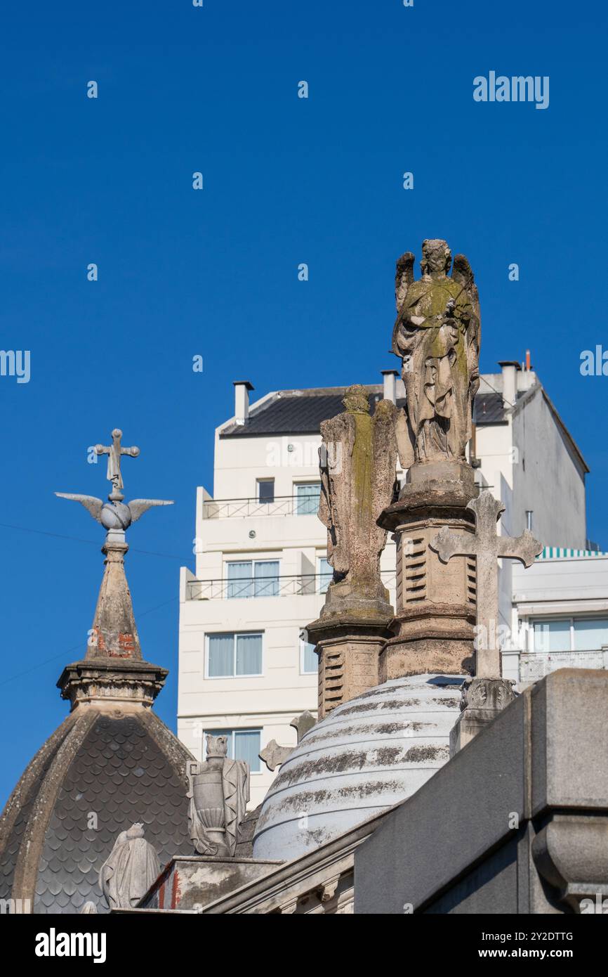 Weathered angel statues on a mausoleum in the Recoleta Cemetery in ...
