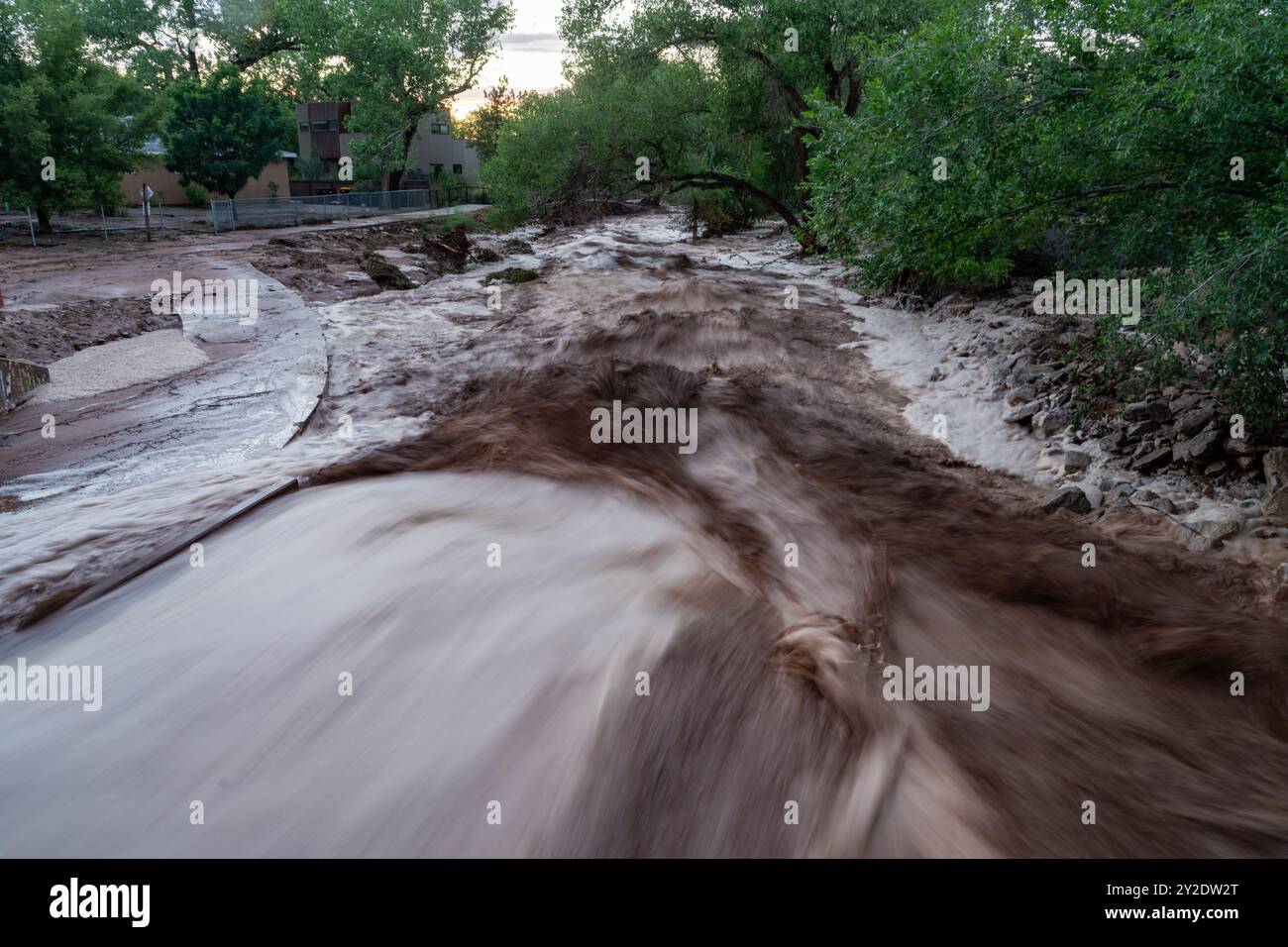 Slow shutter speed smoothing out the turbulent waters of flash flooding ...