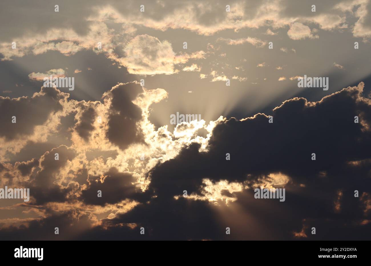 Sun rays are spectacularly filtered by Clouds Stock Photo - Alamy