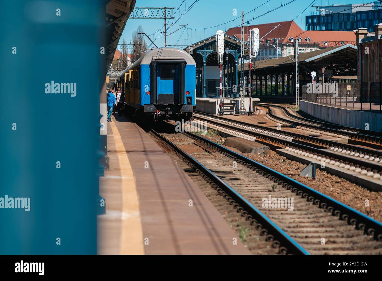 railway track of the main station with an arriving train to Gdansk ...