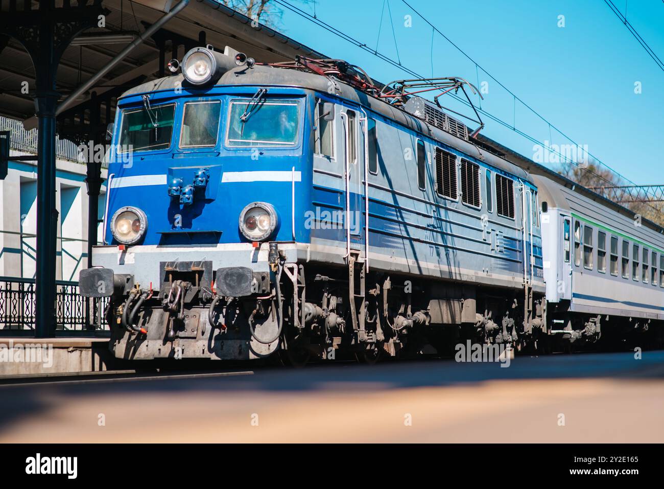railway track of the main station with an arriving train to Gdansk ...