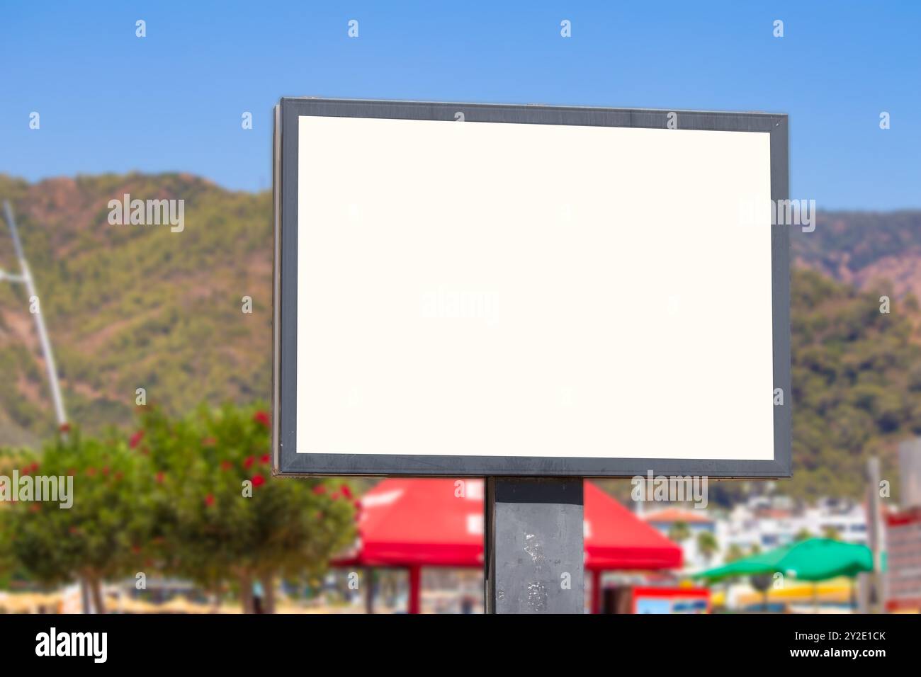 White horizontal advertising poster. Big billboard blue sky background ...