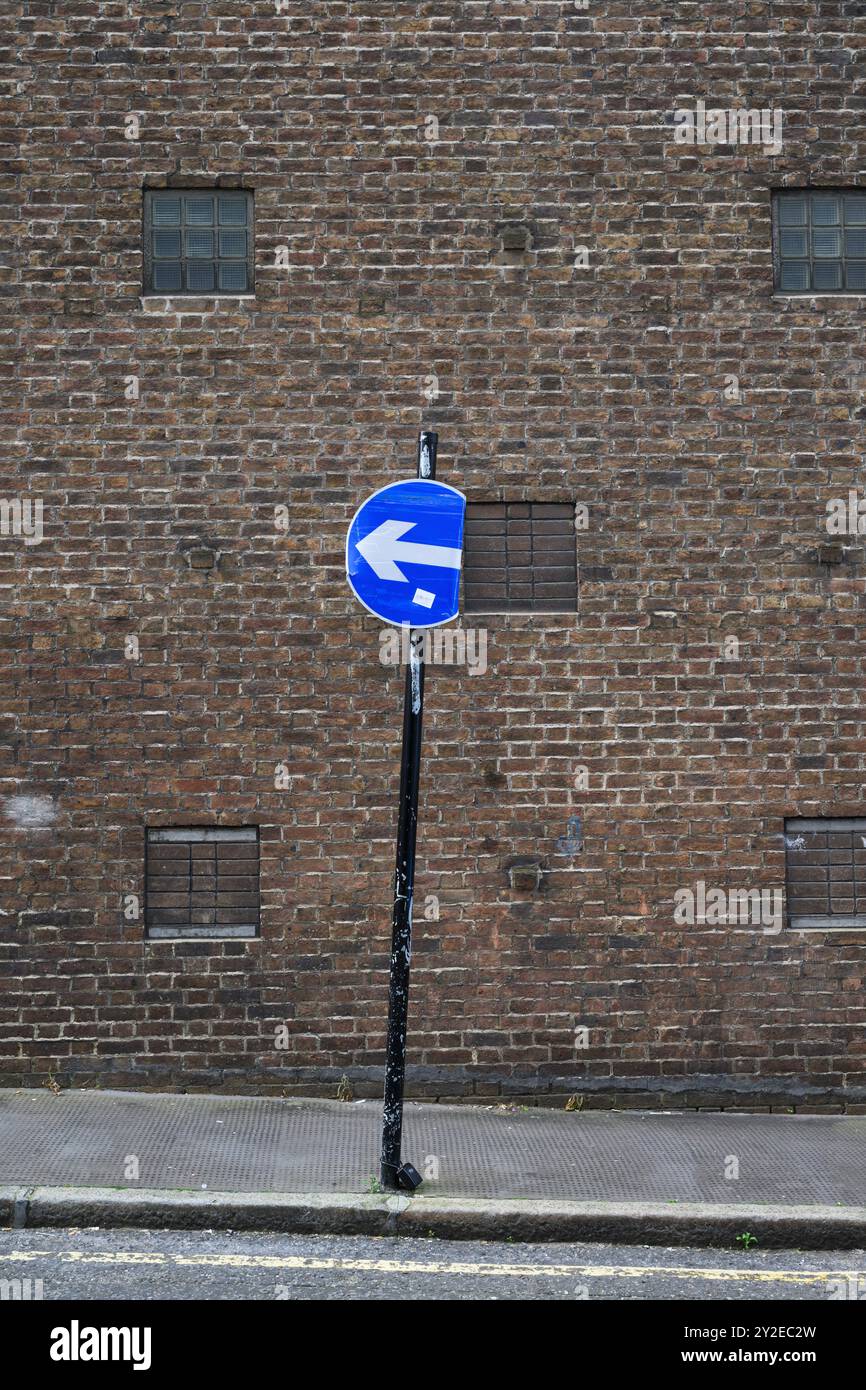 Bent road sign hi-res stock photography and images - Alamy