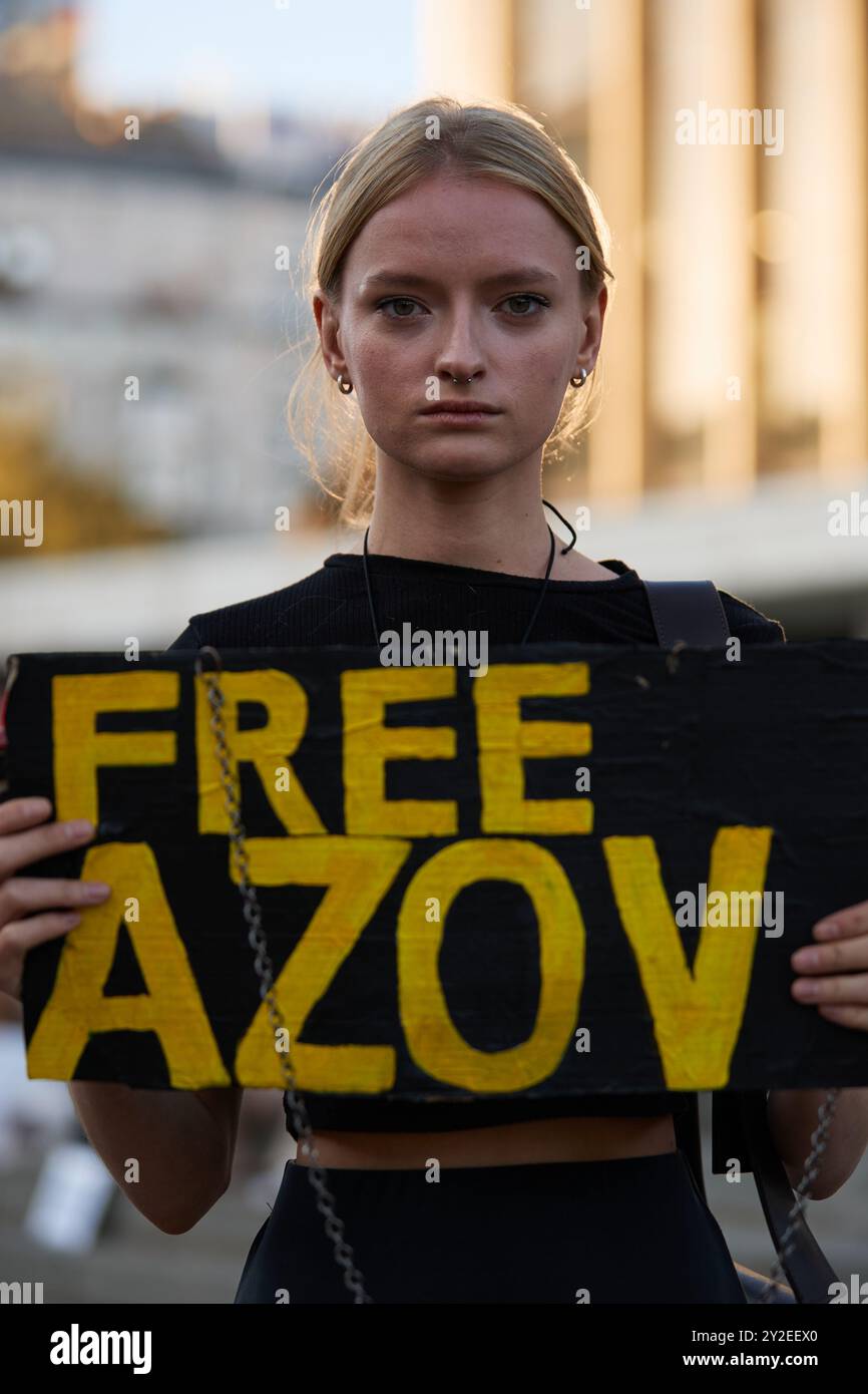 Portrait of Ukrainian activist with a poster Free Azov. Kyiv - 8 September,2024 Stock Photo - Alamy
