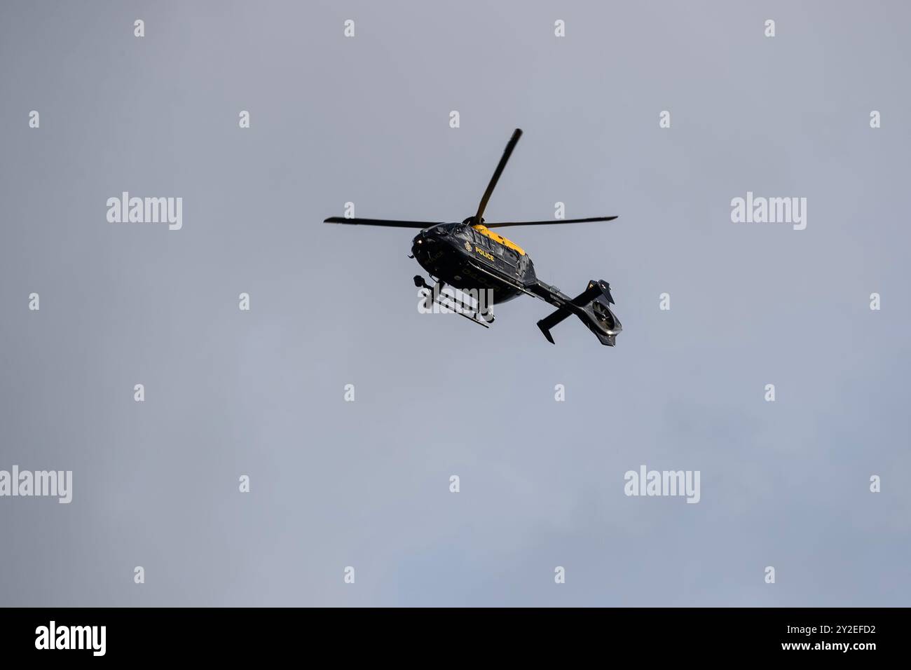 West Yorkshire Police helicopter Airbus H135 flying over Huddersfield ...
