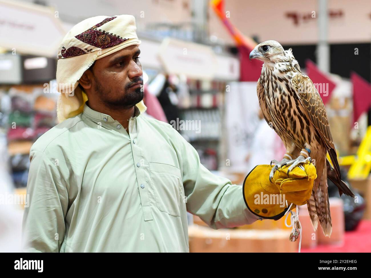 INTERNATIONAL HUNTING AND FALCONS EXHIBITION IN DOHA An exhibitor shows ...