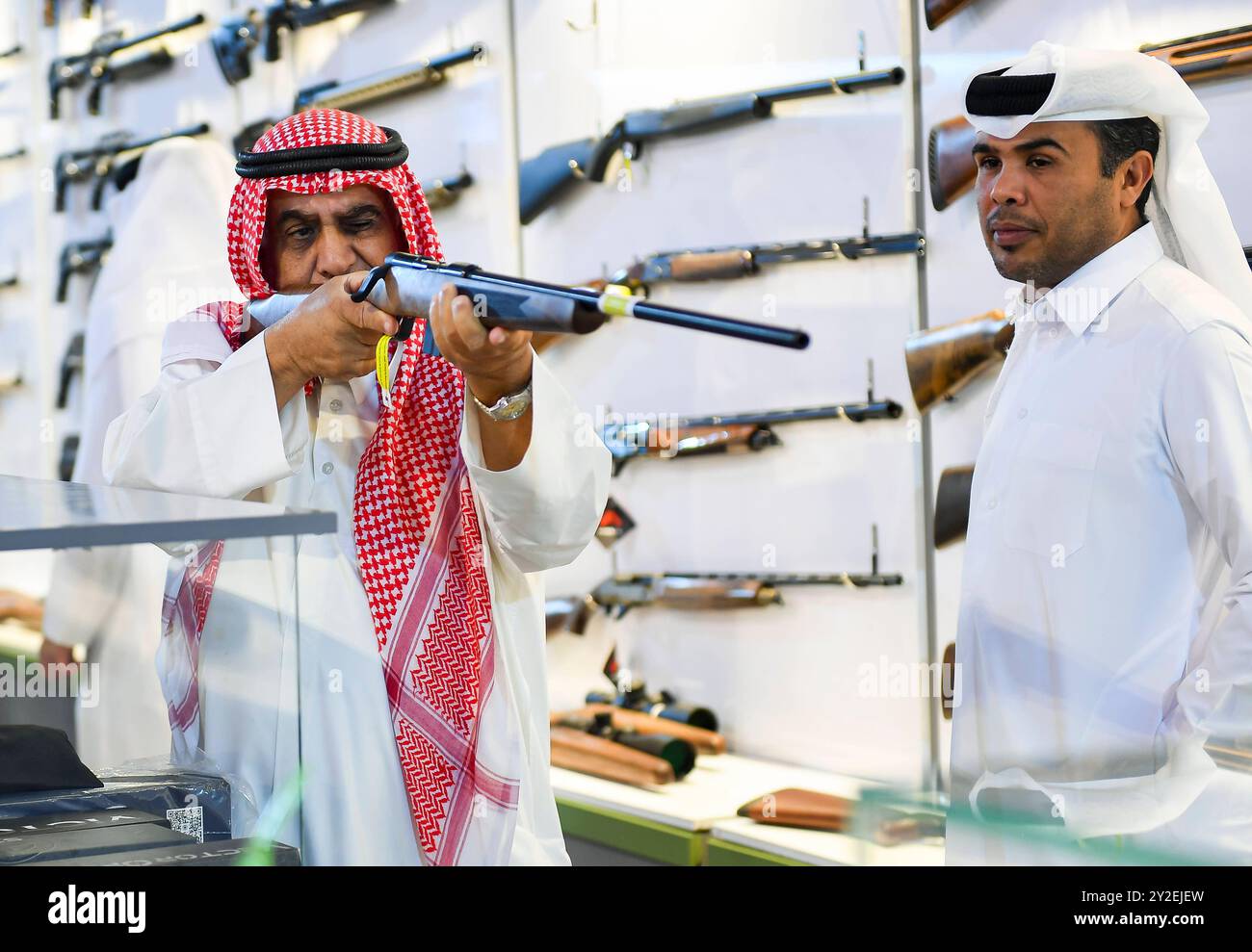 INTERNATIONAL HUNTING AND FALCONS EXHIBITION IN DOHA People check a ...