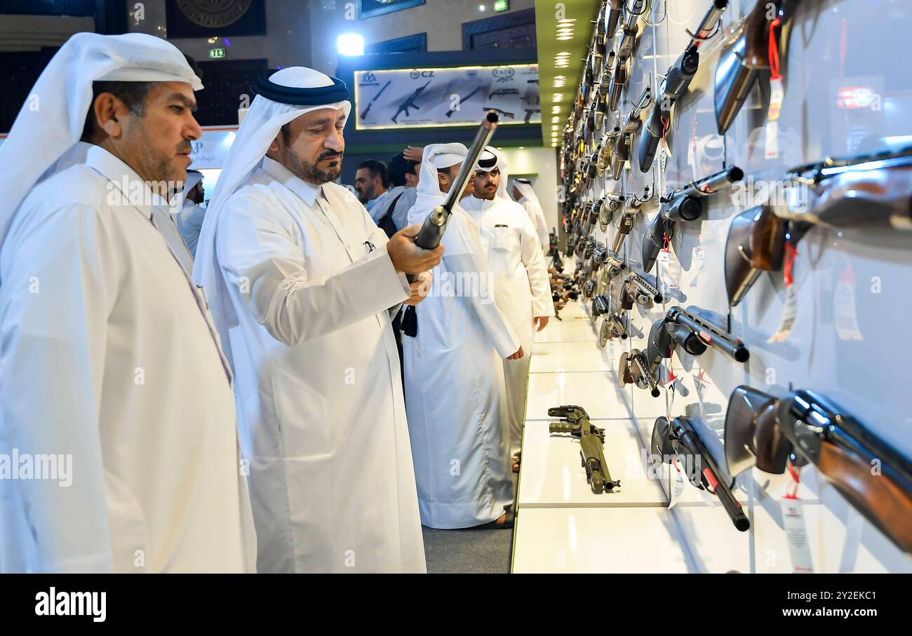 INTERNATIONAL HUNTING AND FALCONS EXHIBITION IN DOHA People check a ...