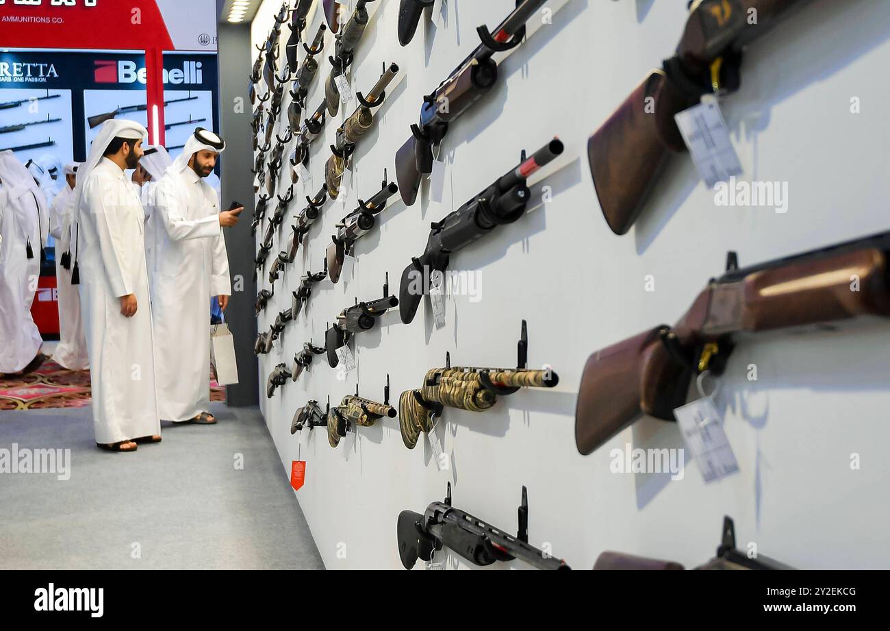 INTERNATIONAL HUNTING AND FALCONS EXHIBITION IN DOHA People check a ...