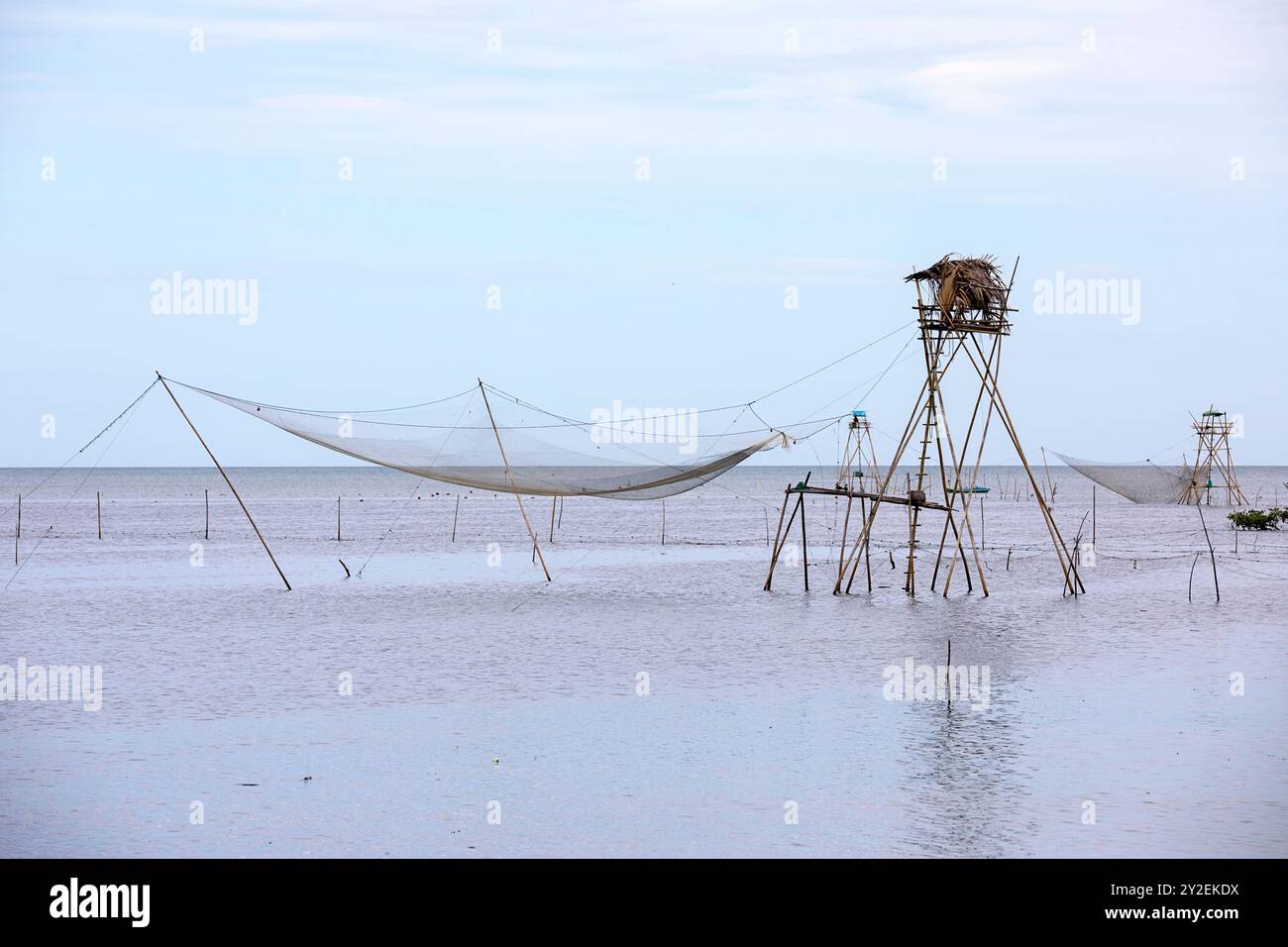 Interesting wooden fishing towers with lifting fishing nets and on the ...