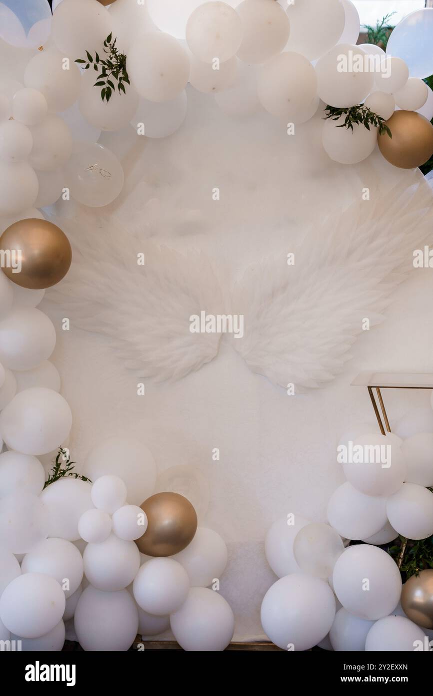 Elegant Balloon Arch with Angel Wings and Gold Accents for Chic Decor ...