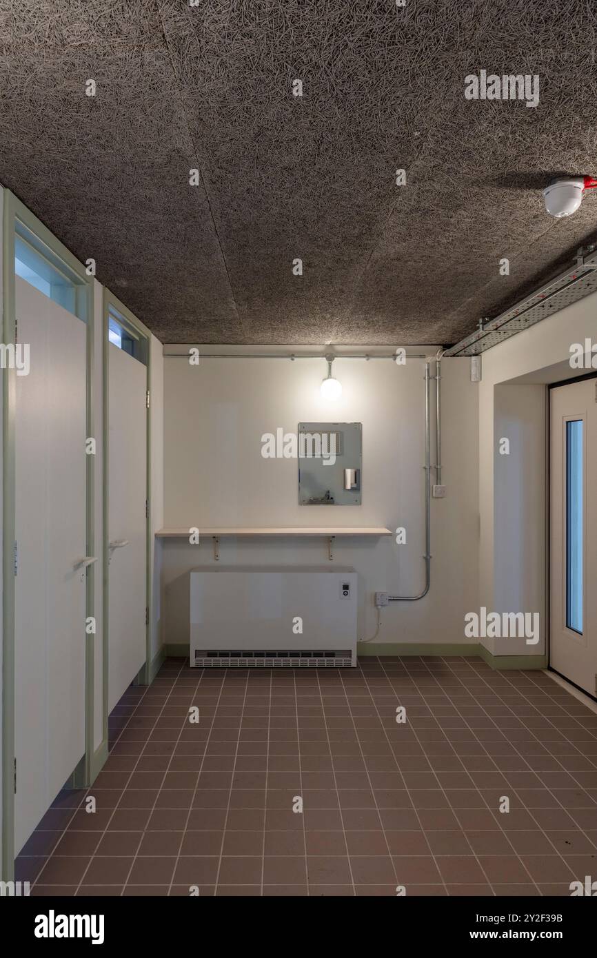 Inside the new shower and toilet facility's. Open Havelock, Southall, United Kingdom. Architect ...