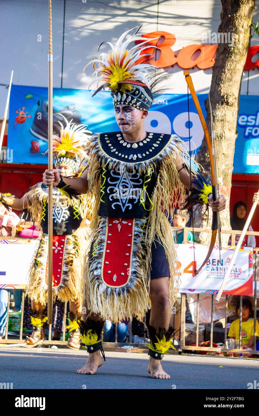 Bakar batu (stone burning) dance from Papua on the 3rd BEN Carnival ...