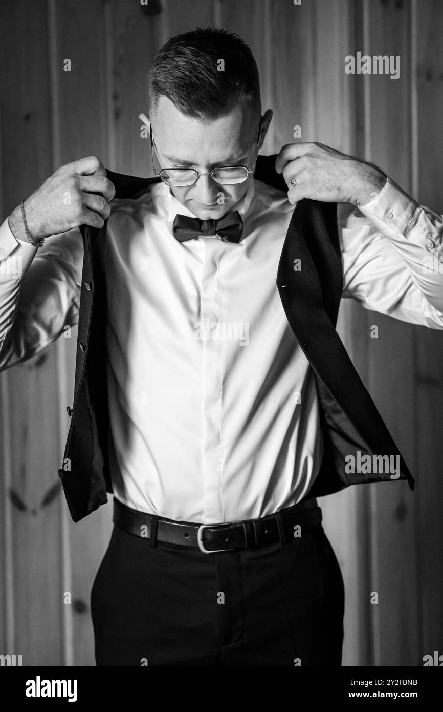 Attire fitting Black and White Stock Photos & Images - Alamy