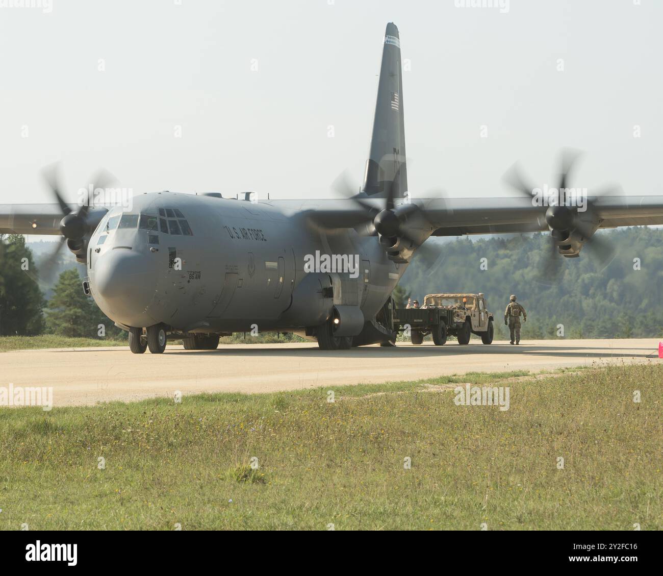 U.S. Army paratroopers assigned to the 173rd Airborne Brigade recover a ...