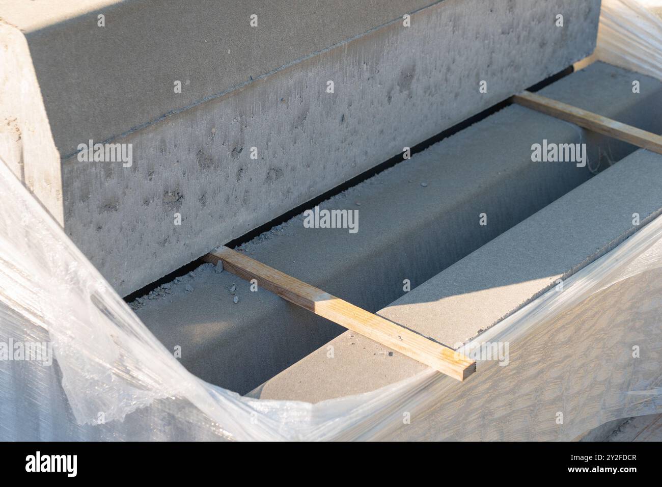 Packing concrete blocks for paving. Construction work. Construction ...