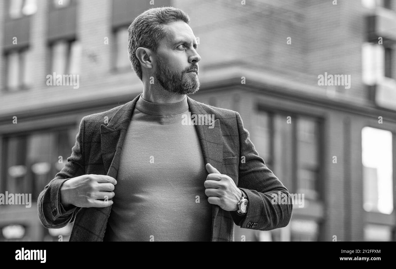 man in menswear outside, advertisement. photo of man in menswear of ...