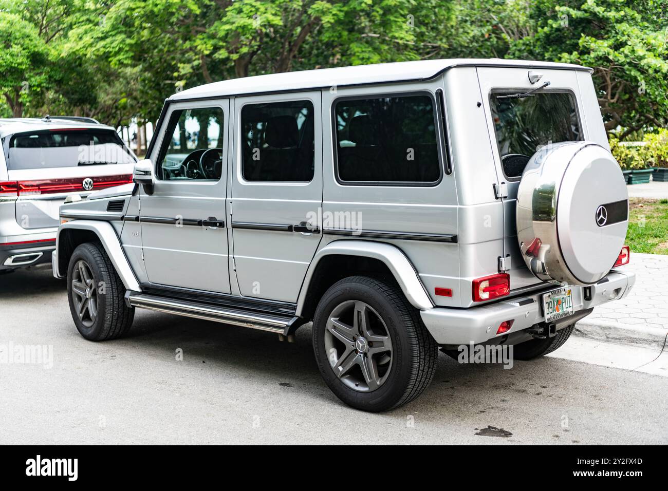 Miami Beach, Florida USA - June 10, 2024: Mercedes G55 AMG V8 Kompressor. Mercedes benz white ...