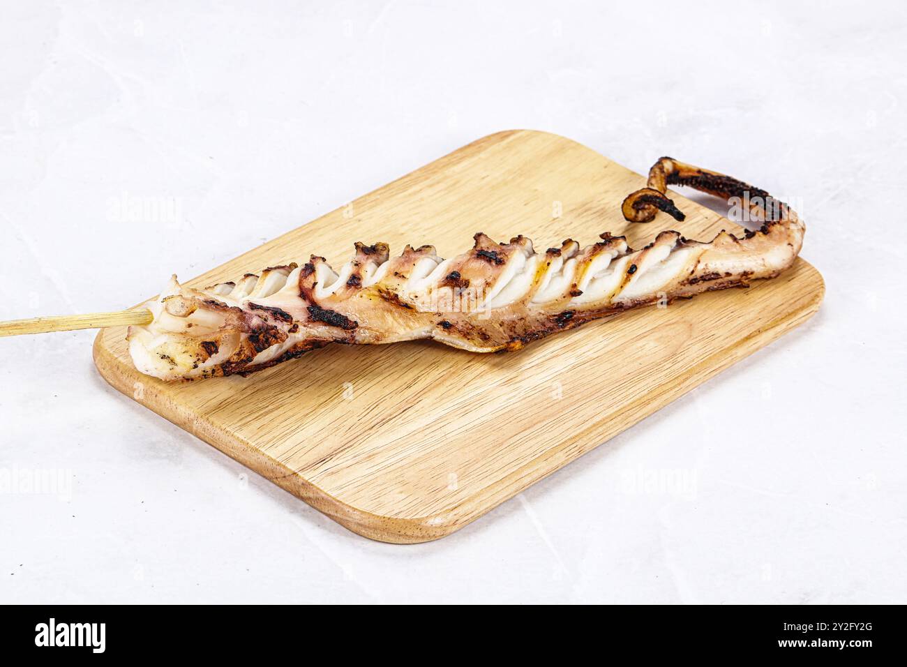 Delicous tasty Grilled octopus tentacle snack Stock Photo - Alamy