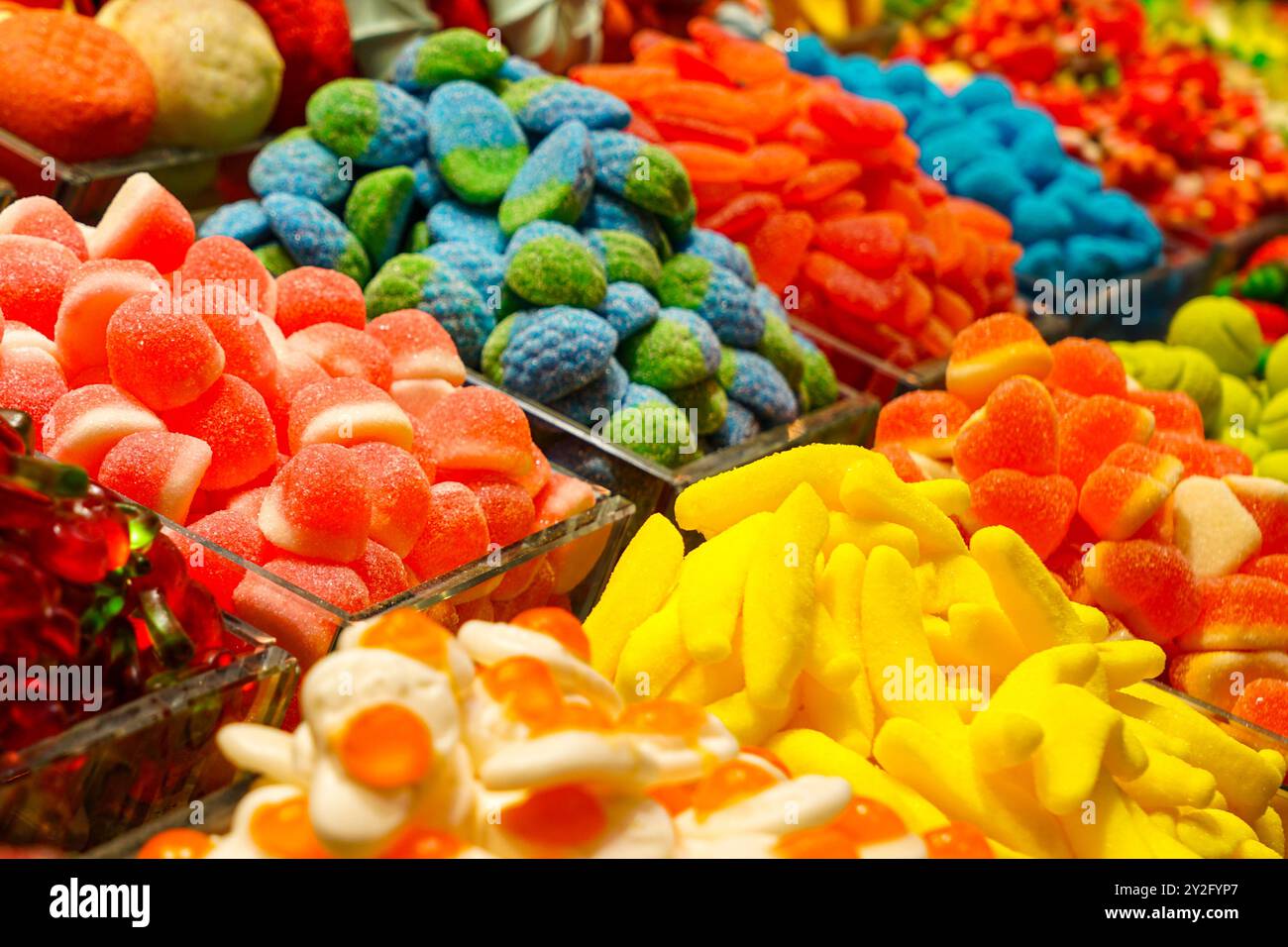 Various bright colors and taste candy assortment at market in Barcelona ...
