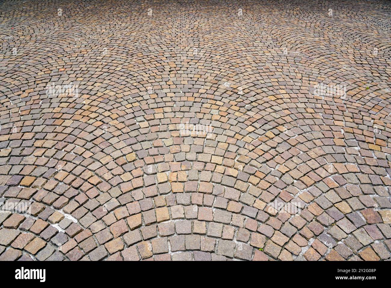 Fan-shaped pavement made of square natural granite cobble stones ...
