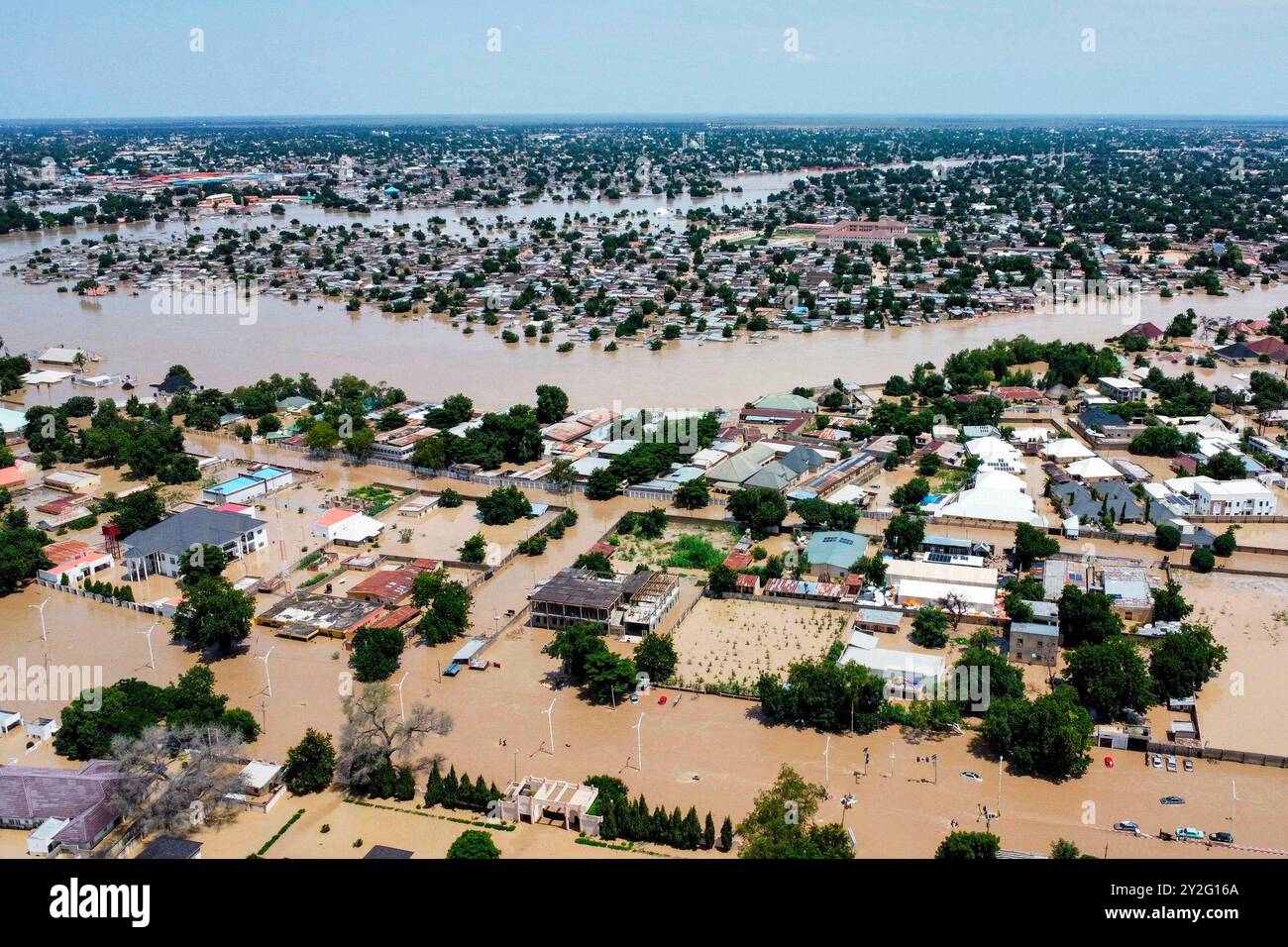 Houses are partially submerged following a dam collapse in Maiduguri, Nigeria, Tuesday, Sept 10 ...