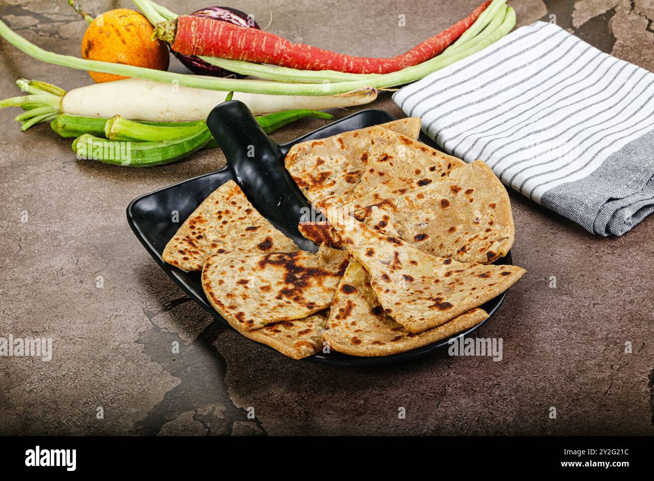 Indian vegetarian Aloo Paratha - bread with potato Stock Photo - Alamy