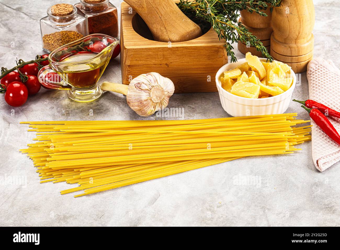 Raw dry Italian pasta - spaghetti for bowl Stock Photo - Alamy