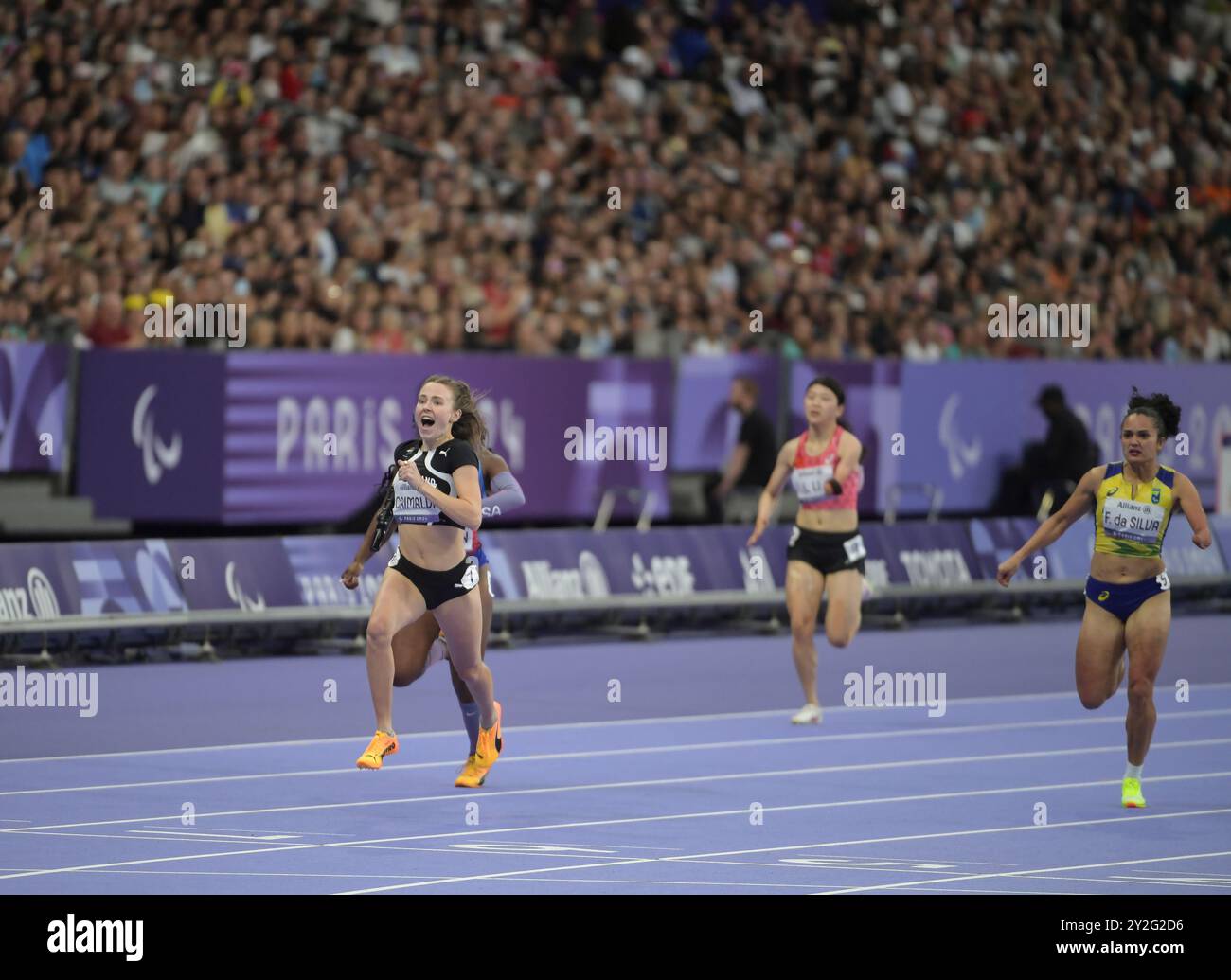 Anna Grimaldi of New Zealand competing in the women’s 200m T47 race at ...