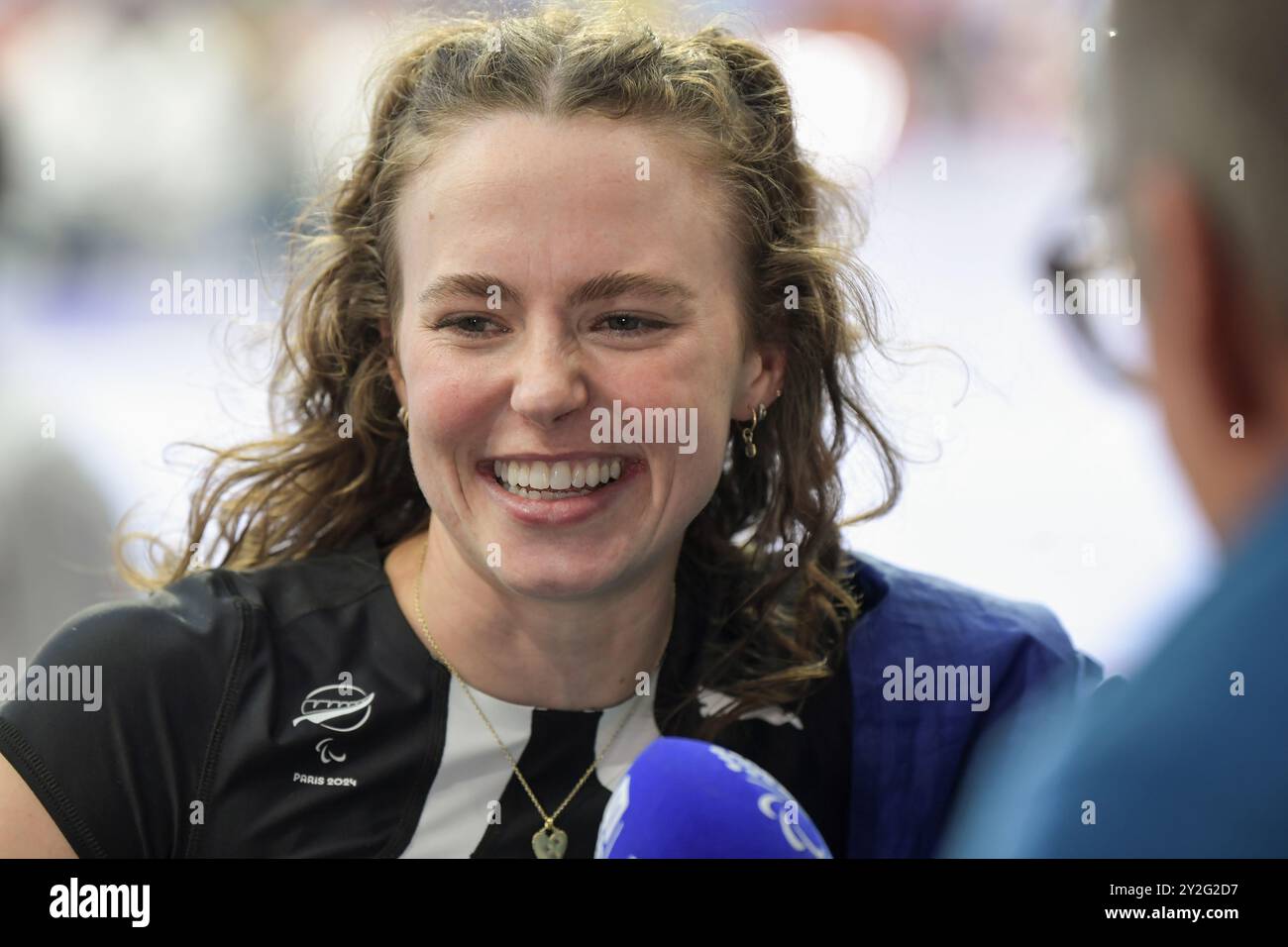 Anna Grimaldi of New Zealand being interviewed by TV after winning the ...